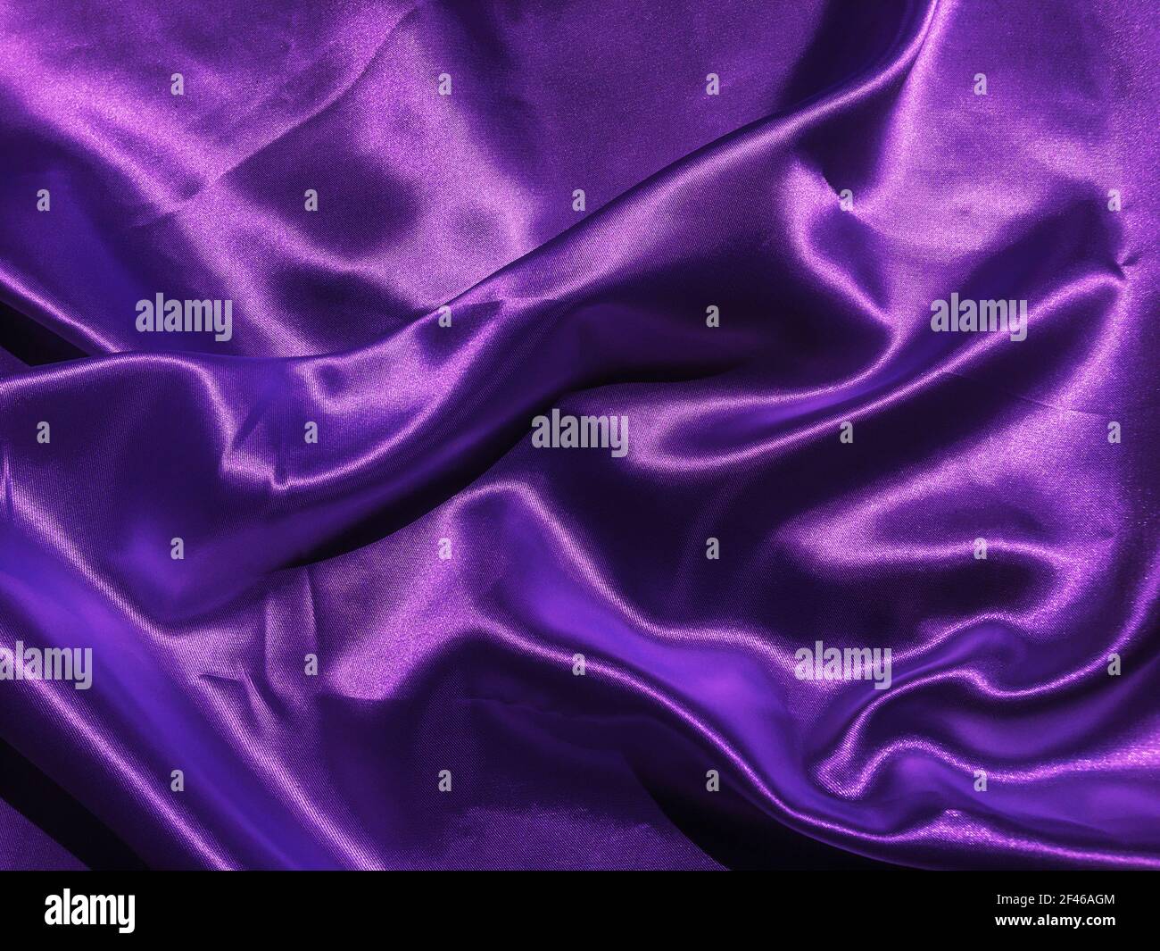 Beautiful smooth purple fabric texture background with copy space for ...