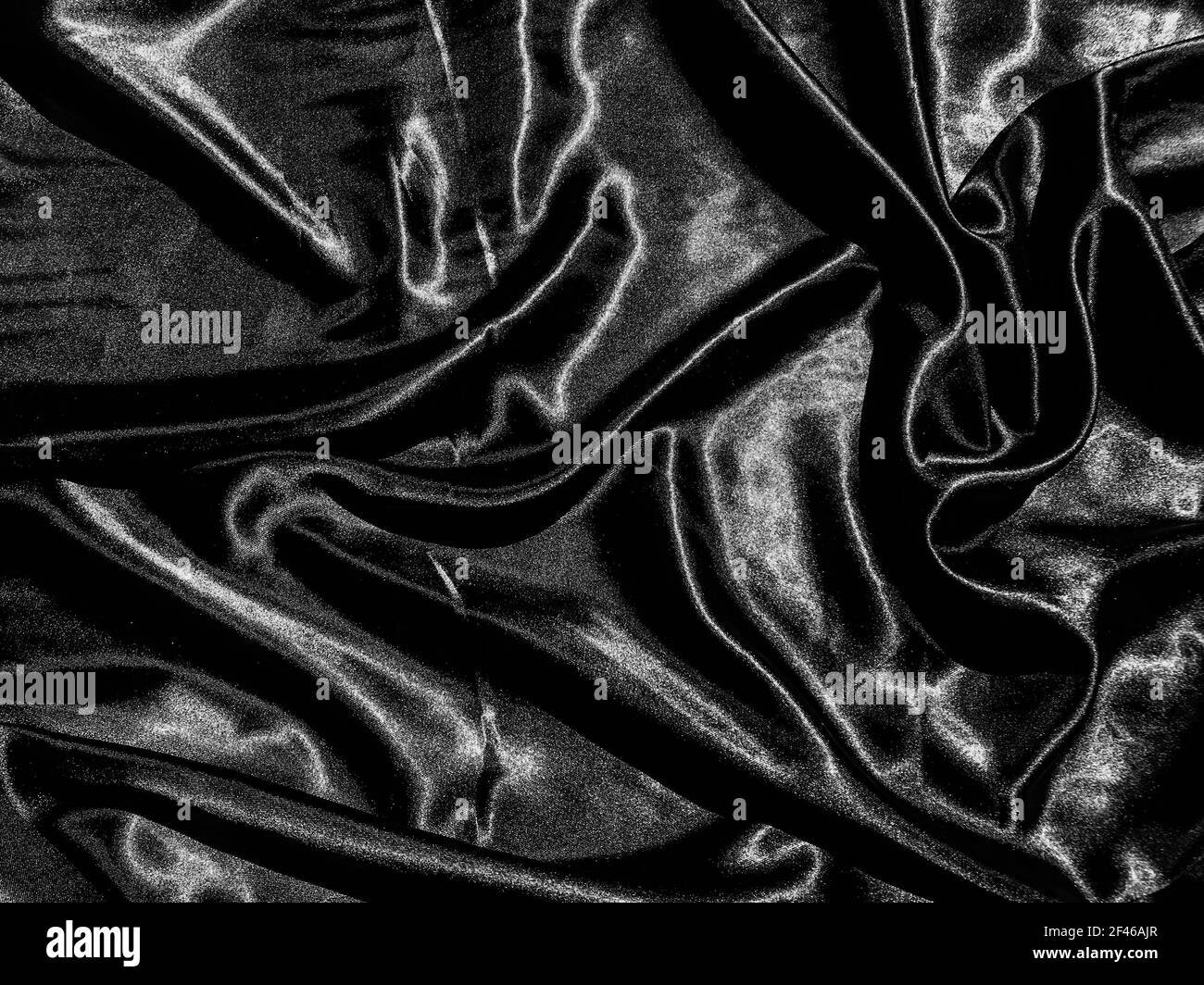 Black cloth or fabric texture background with liquid wave or wavy folds ...