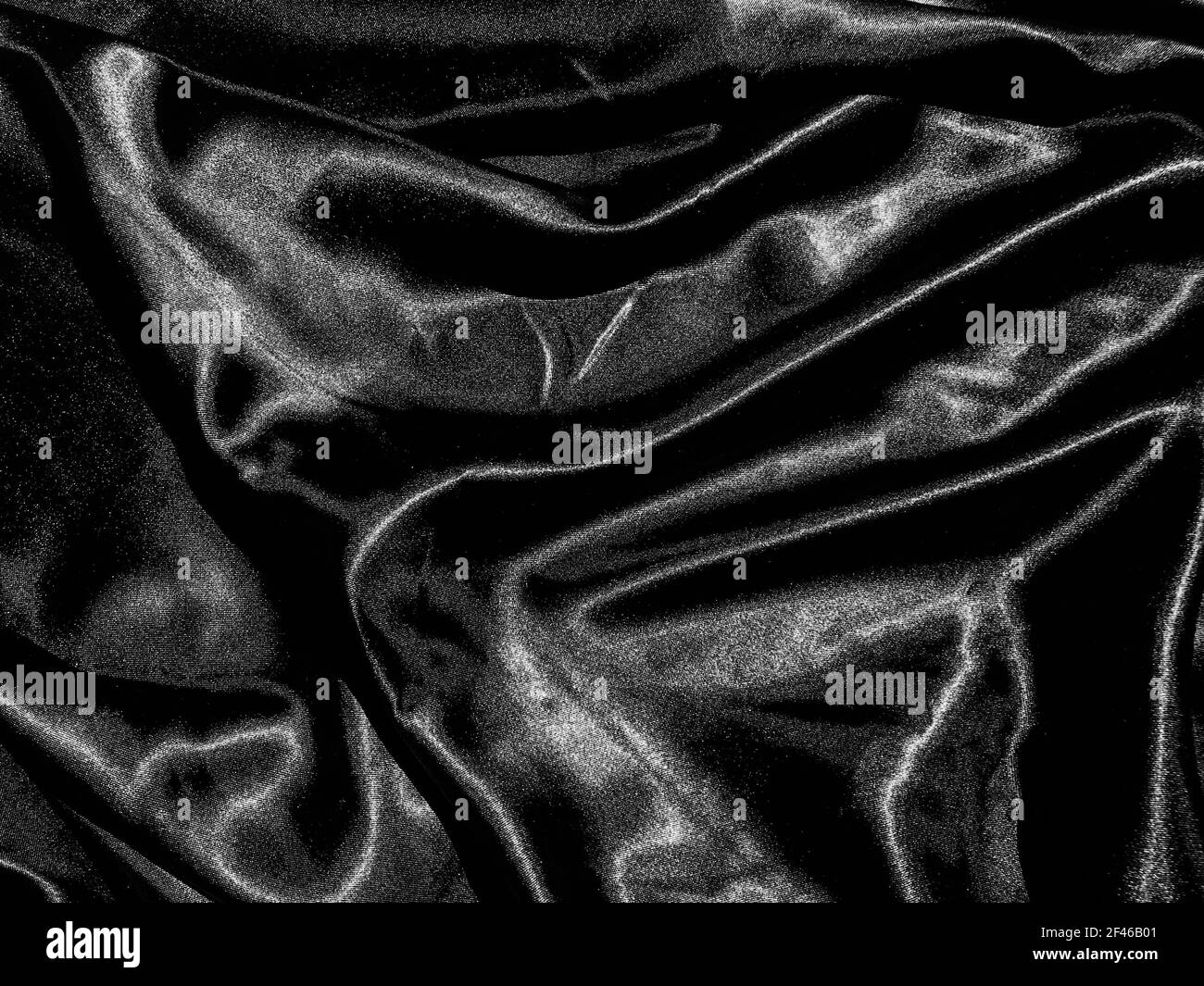 Dark silk or satin texture background with copy space for text or ...