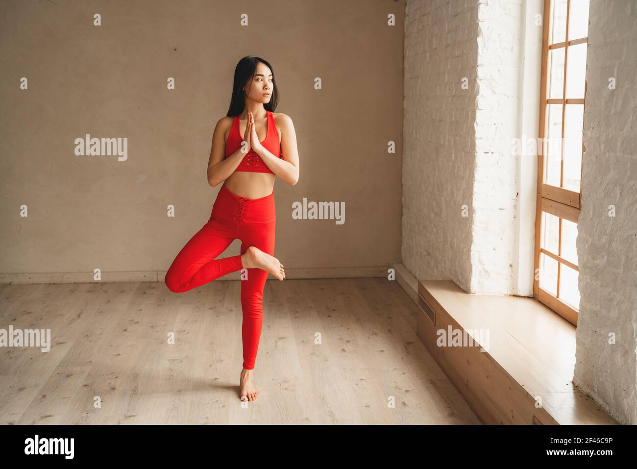 Fit athletic woman doing yoga, self control. Beautiful women working ... Fit athletic woman doing yoga, self control. Beautiful women working ...