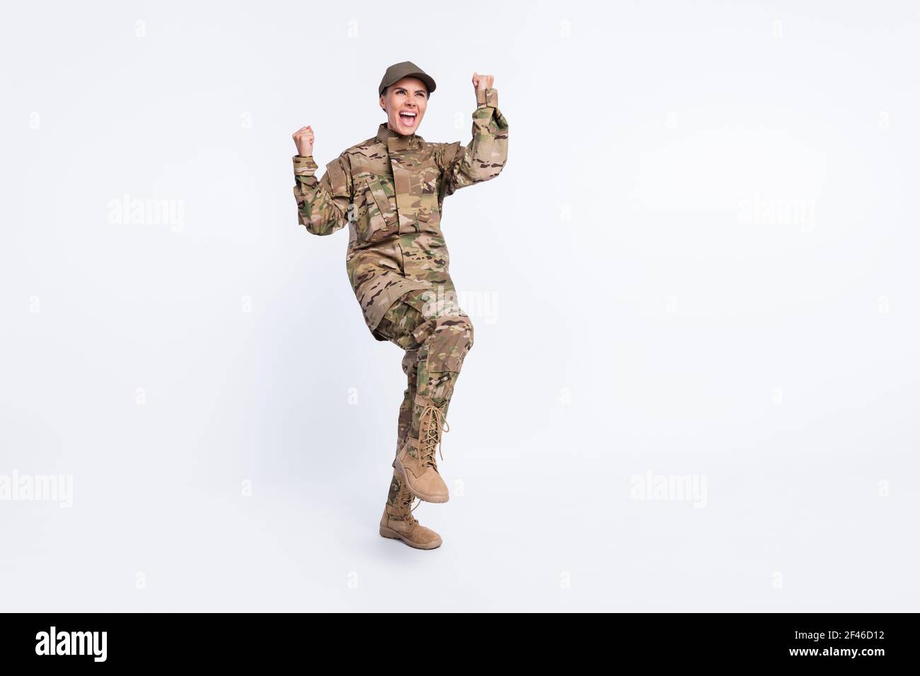 Full body photo of young woman soldier happy positive smile rejoice win ...