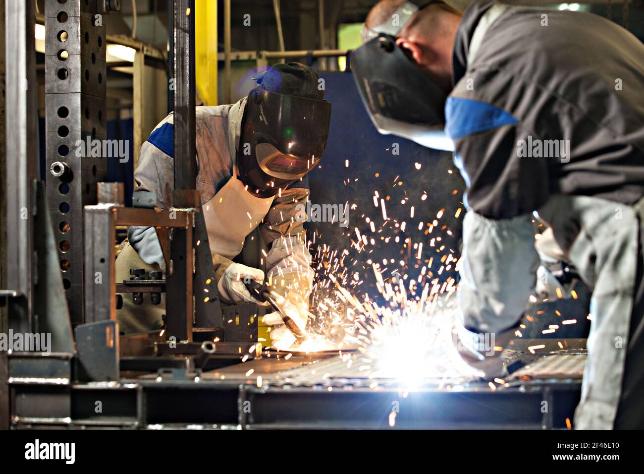 manual welding of metal pieces Stock Photo - Alamy