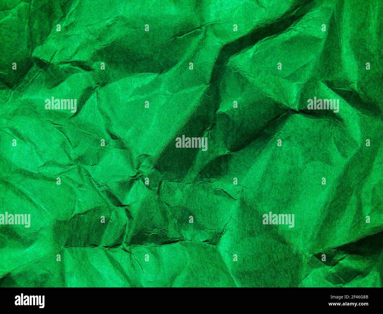 Closeup view of green crumpled paper texture background Stock Photo - Alamy