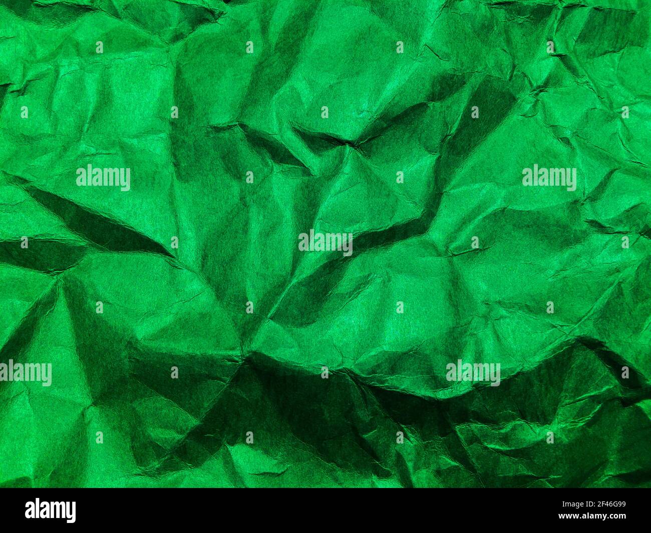 Closeup view of green crumpled paper texture background Stock Photo - Alamy