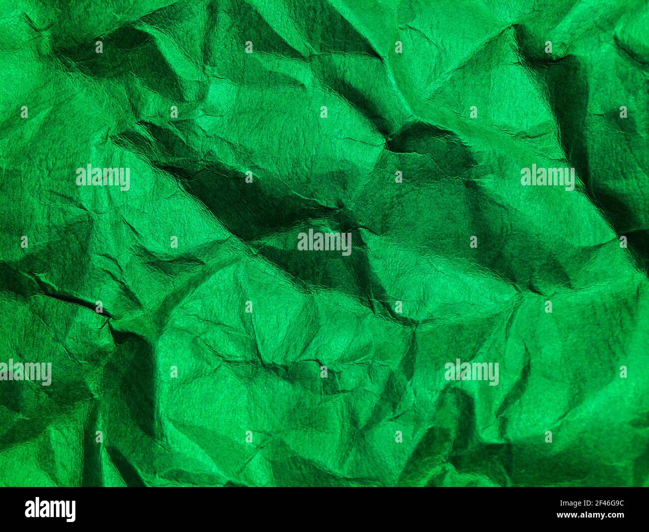 Closeup view of green crumpled paper texture background Stock Photo - Alamy