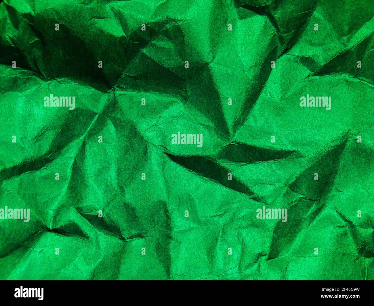 Closeup view of green crumpled paper texture background Stock Photo - Alamy