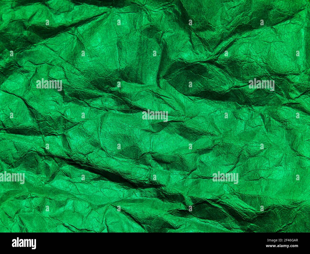 Closeup view of green crumpled paper texture background Stock Photo - Alamy