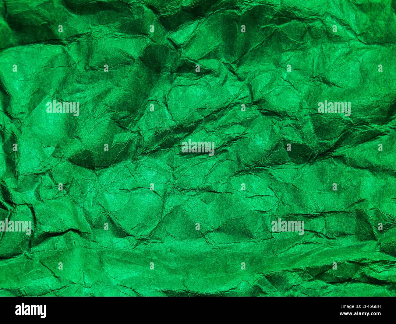 Closeup view of green crumpled paper texture background Stock Photo - Alamy