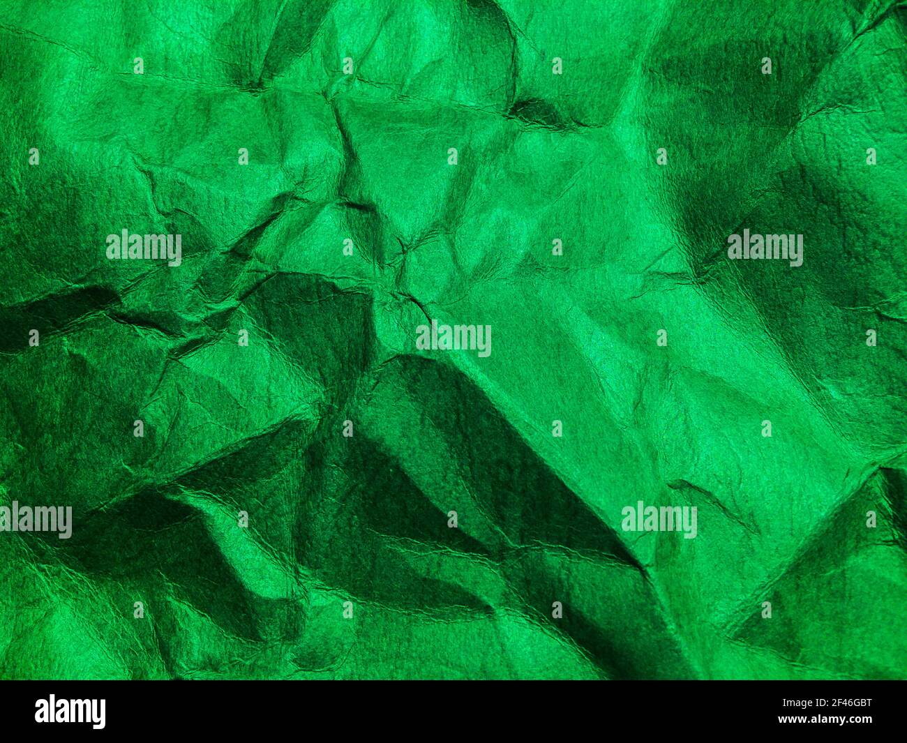 Closeup view of green crumpled paper texture background Stock Photo - Alamy