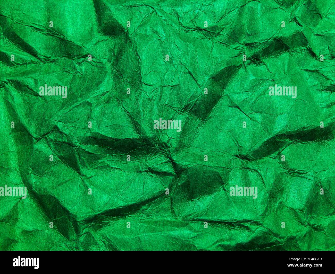 Closeup view of green crumpled paper texture background Stock Photo - Alamy