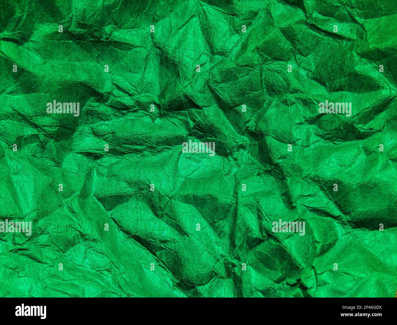 Closeup view of green crumpled paper texture background Stock Photo - Alamy