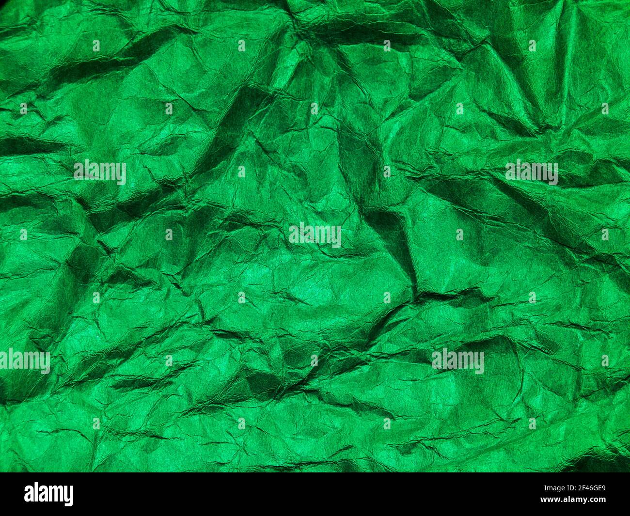 Closeup view of green crumpled paper texture background Stock Photo - Alamy