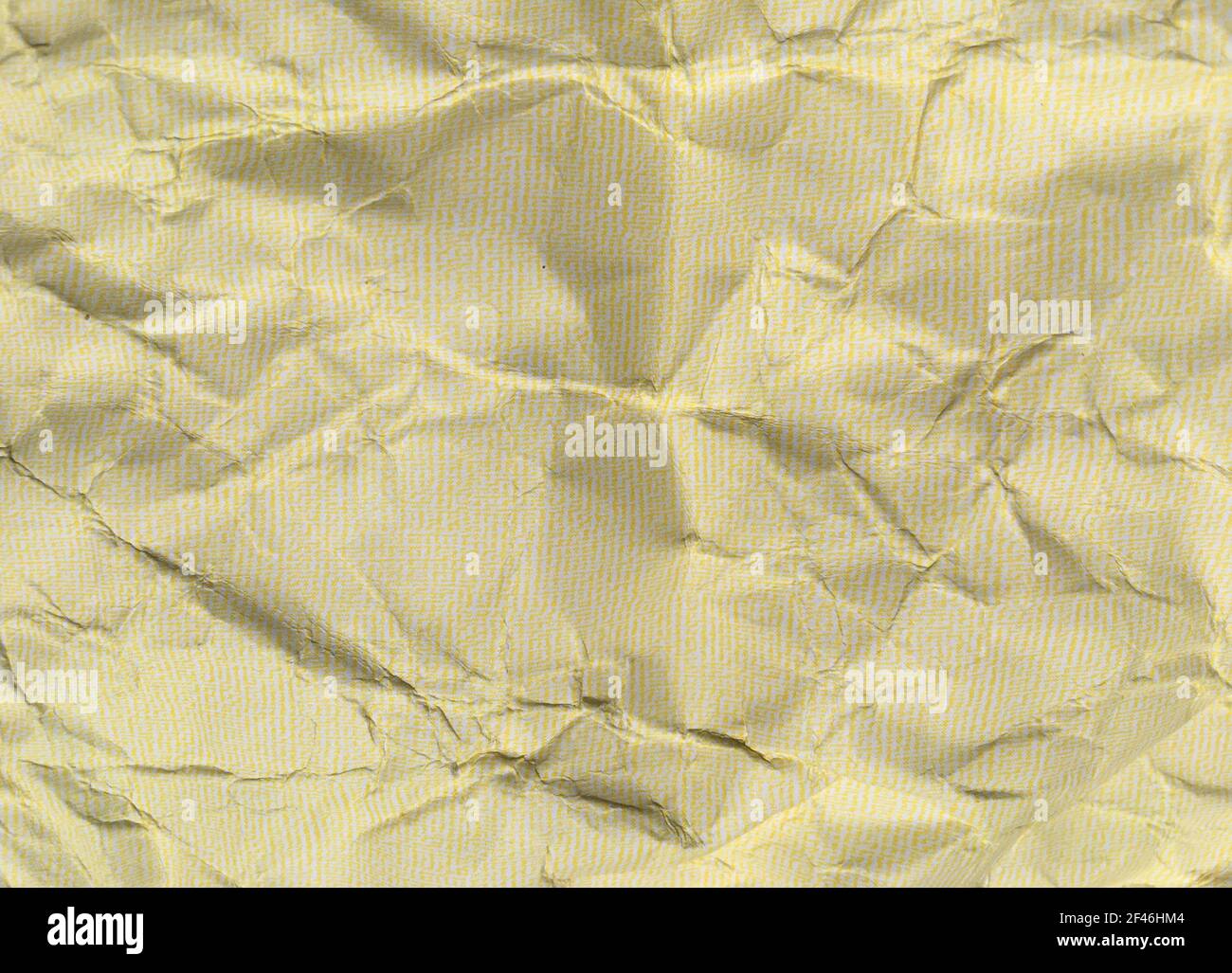 Yellow crumpled paper background with pattern for design Stock Photo ...