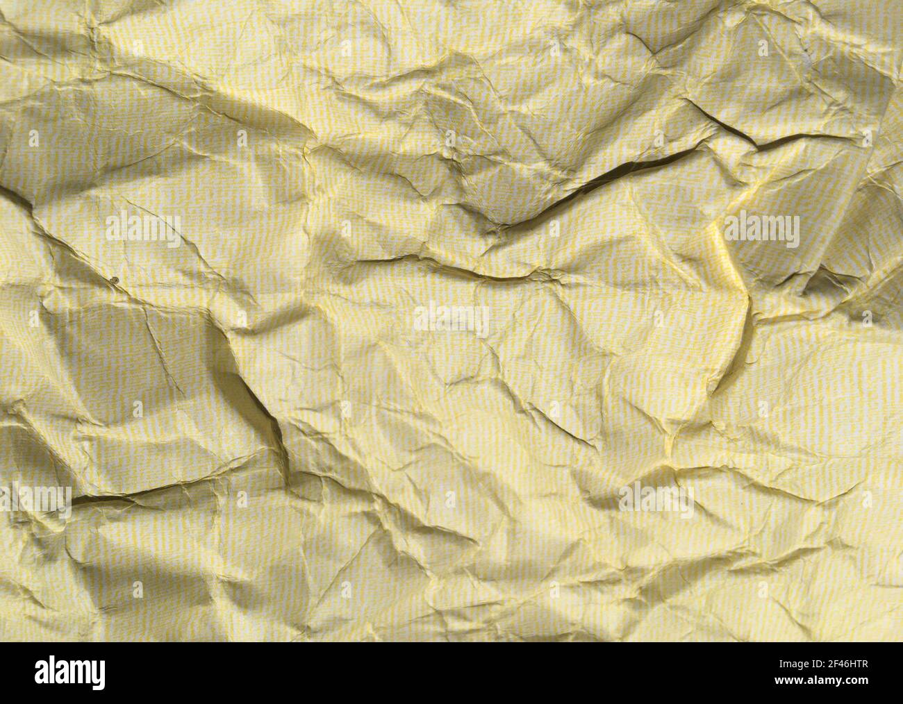 Yellow Crumpled Paper Background With Pattern For Design Stock Photo
