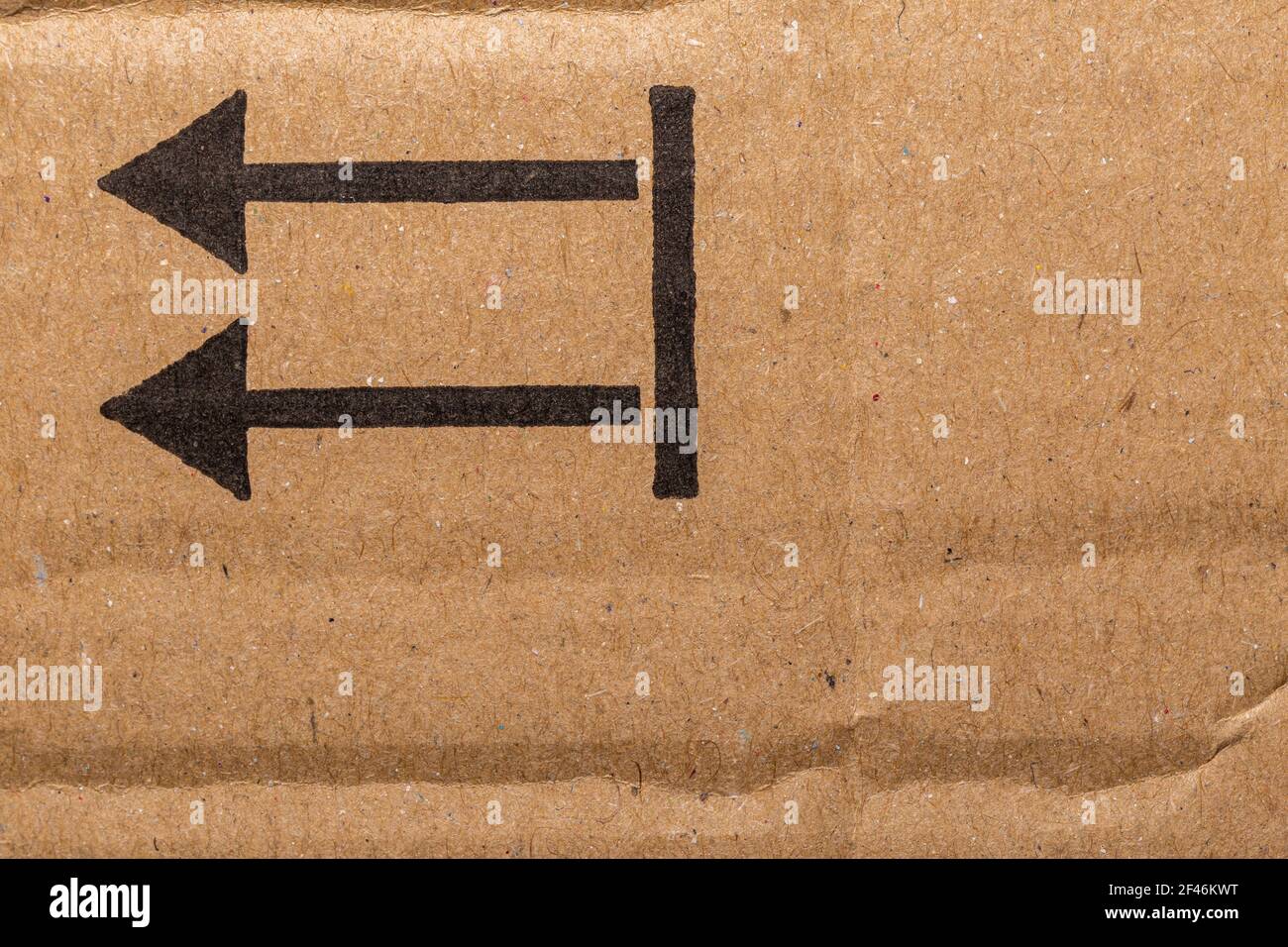 Plain Brown Cardboard with Arrows Background Stock Photo - Alamy