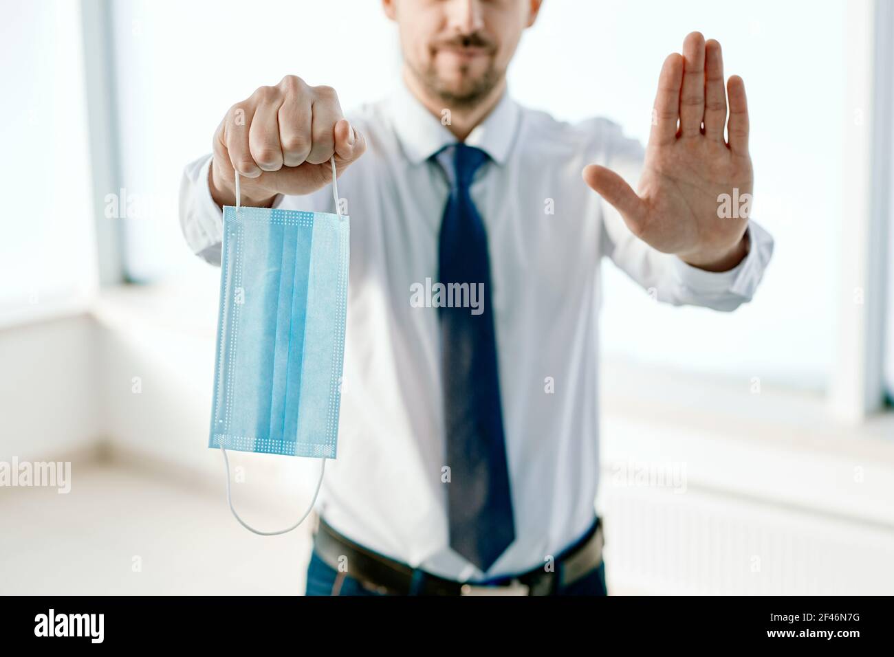 Man holding out hand stop hi-res stock photography and images - Alamy