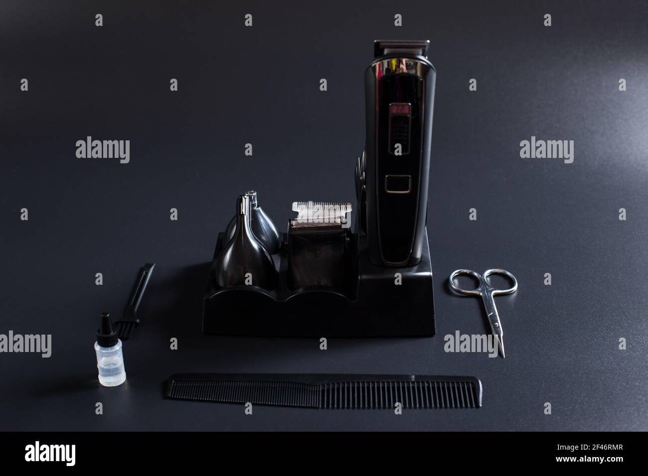 Set of shaving machine with attachments and other tools for barber on a ...