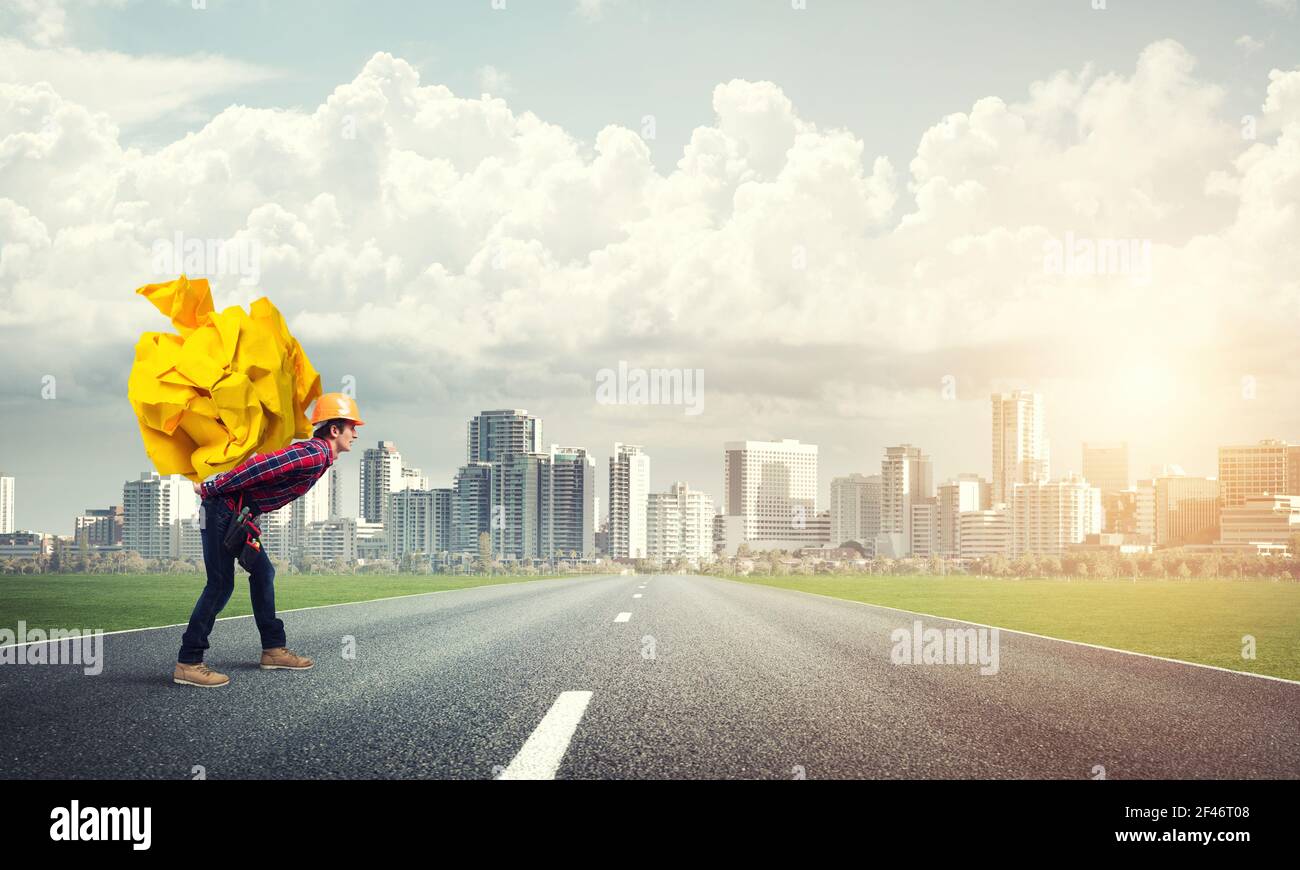 Engineer man carry load Stock Photo - Alamy