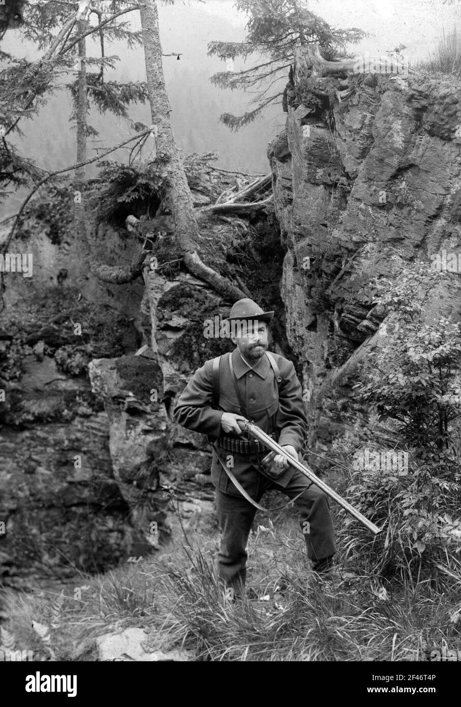 Hunter on the summer stone Stock Photo - Alamy