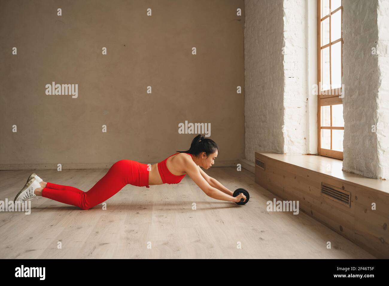 Woman workout at health club. Sporty attractive female working out ...