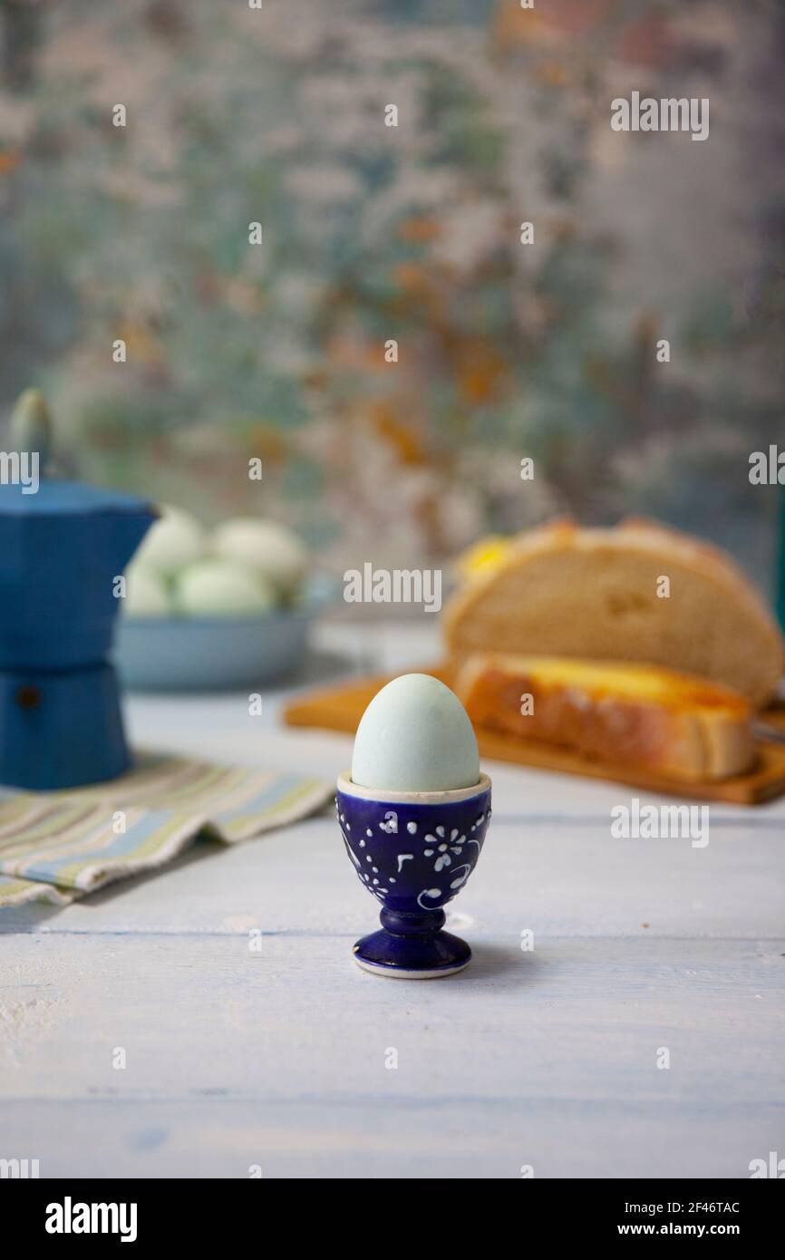 Boiled Blue eggs on a rustic farm table for breakfast Stock Photo - Alamy