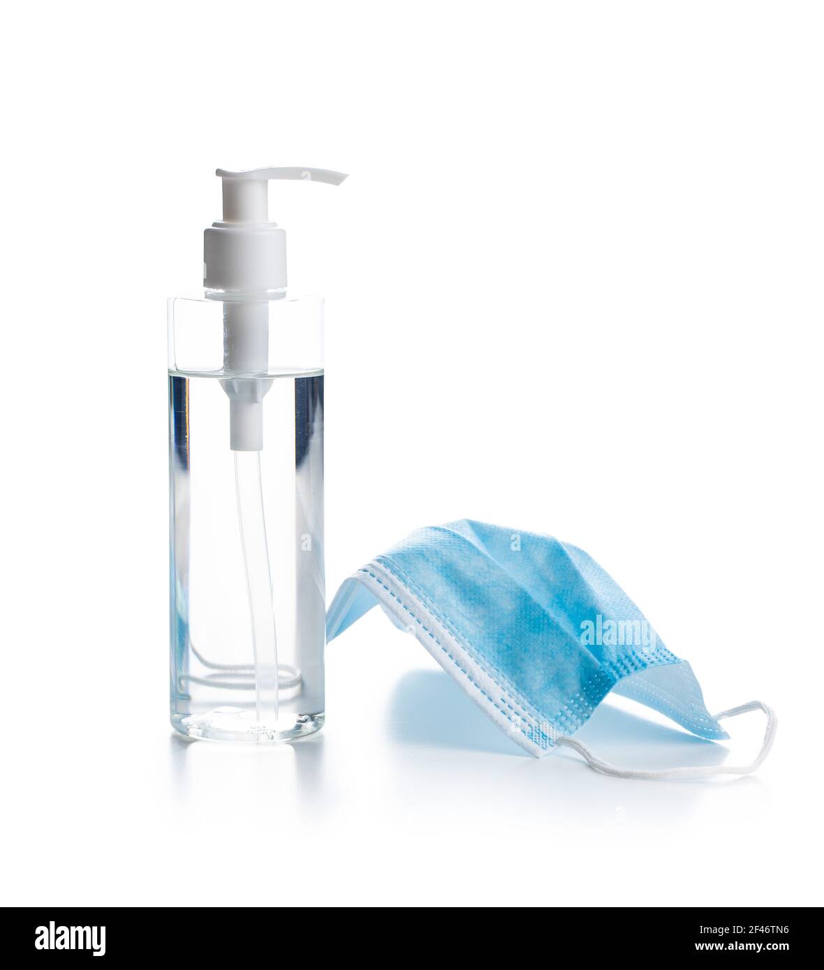 Coronavirus prevention hand sanitizer and medical face mask. Hand ...