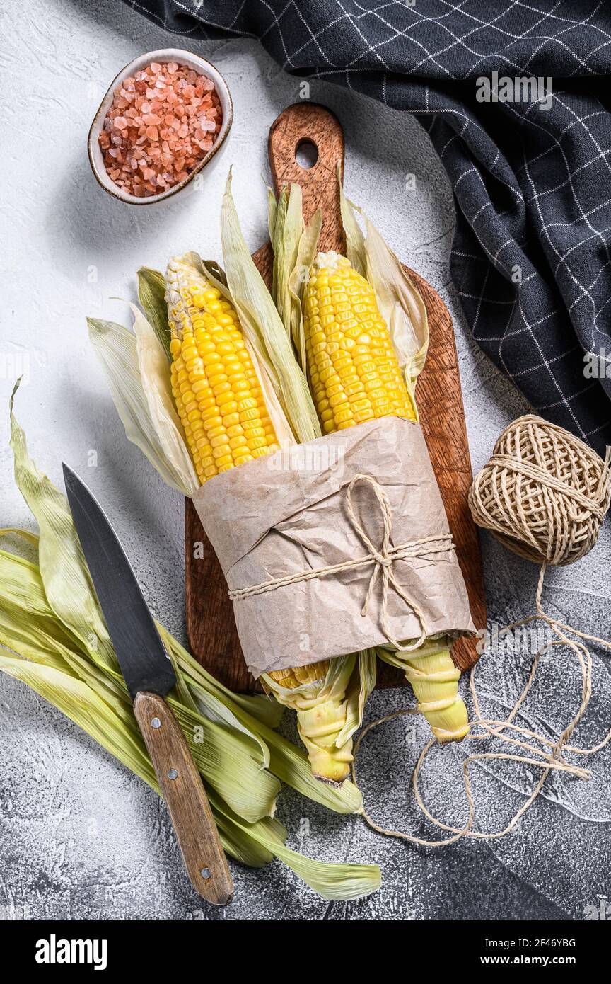 Fresh harvested corn cob on farmer market, local vegetables. Gray ...