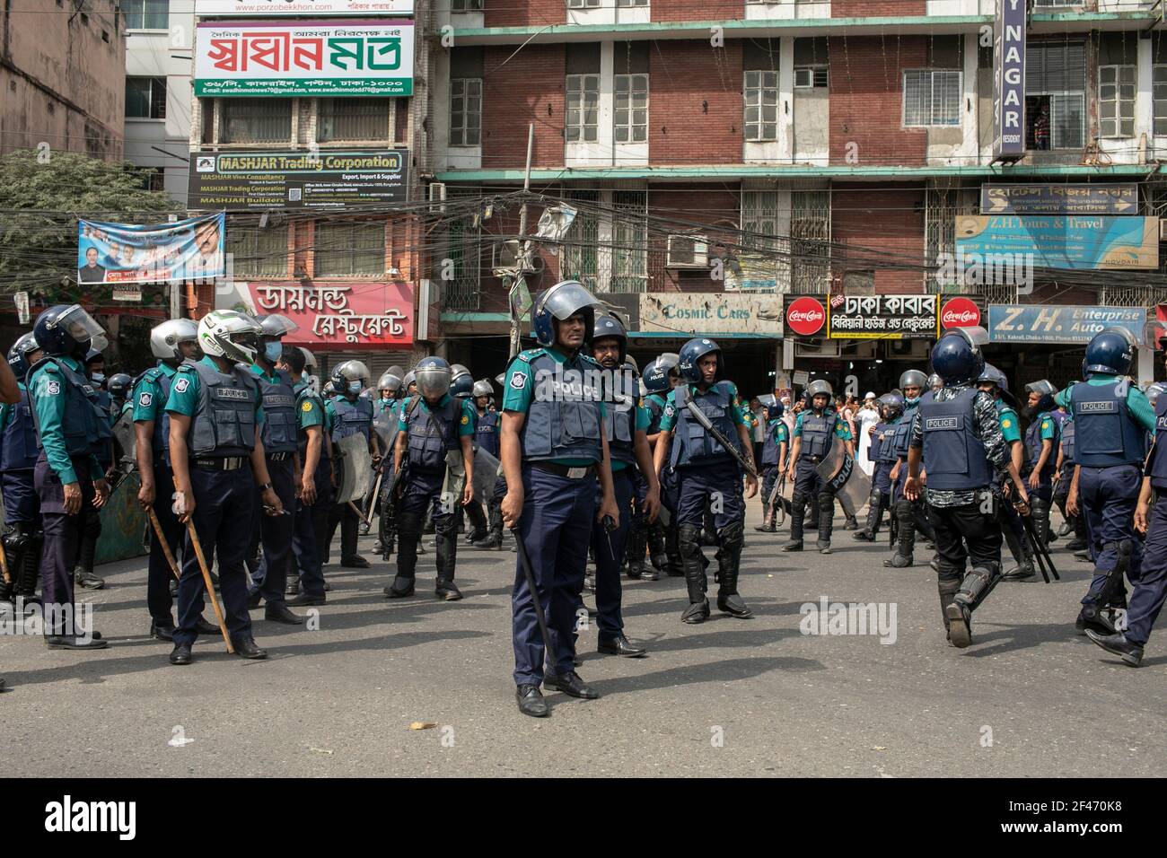 Dhaka, Bangladesh. 19th Mar, 2021. Riot police stand on guard during ...