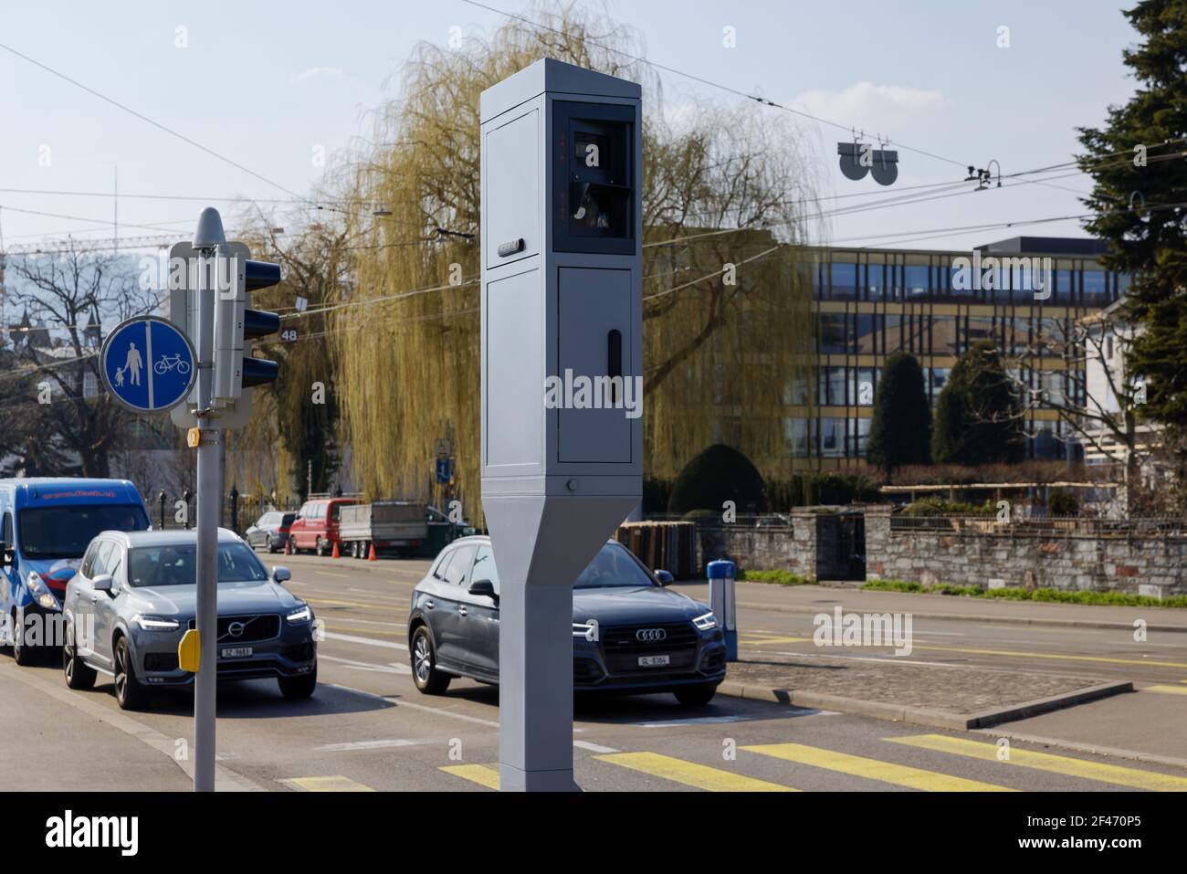 Road traffic: speed and red light radar in one device, cars stop in the ...