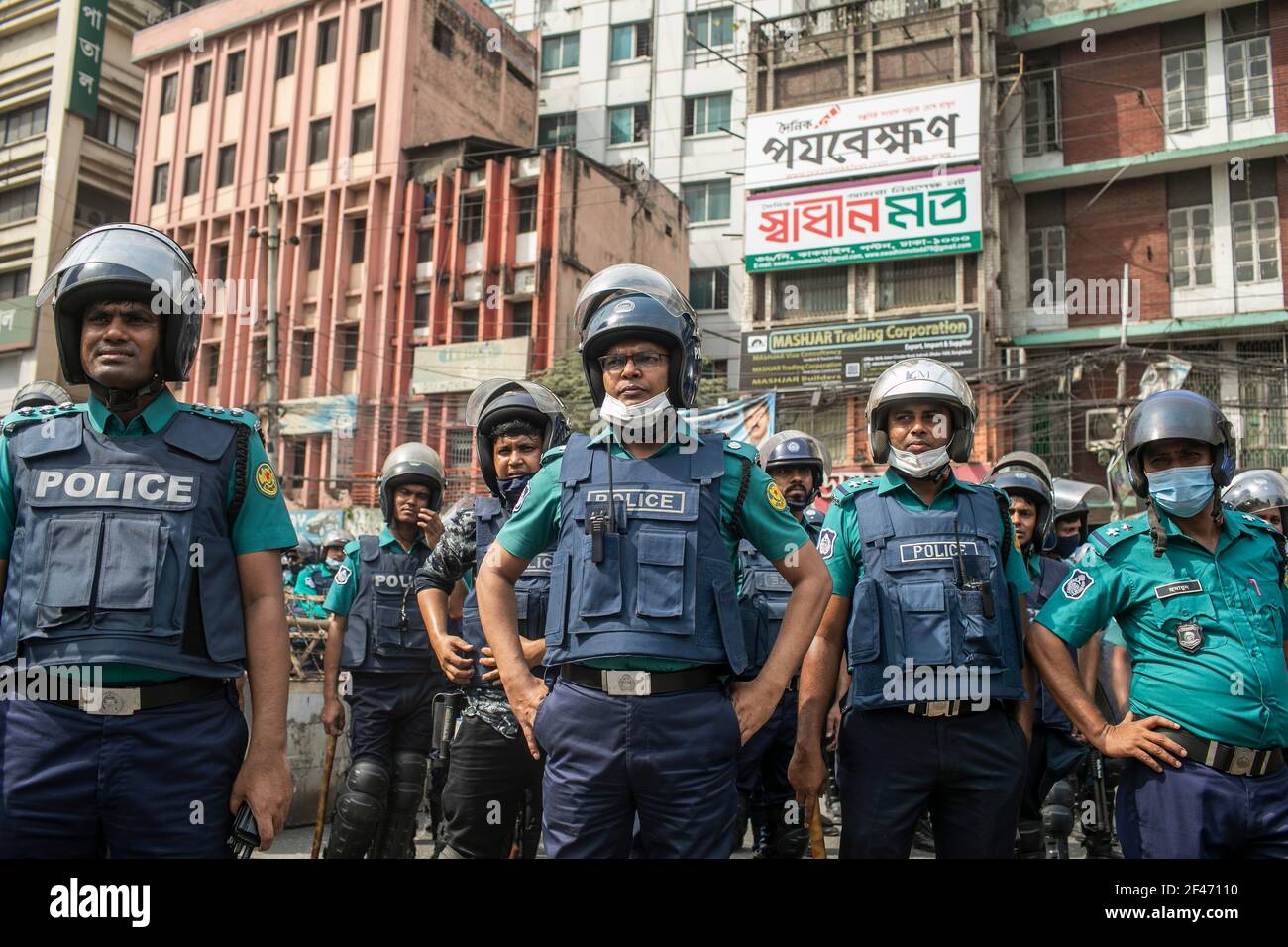 Dhaka, Bangladesh. 19th Mar, 2021. Riot police stand on guard during ...