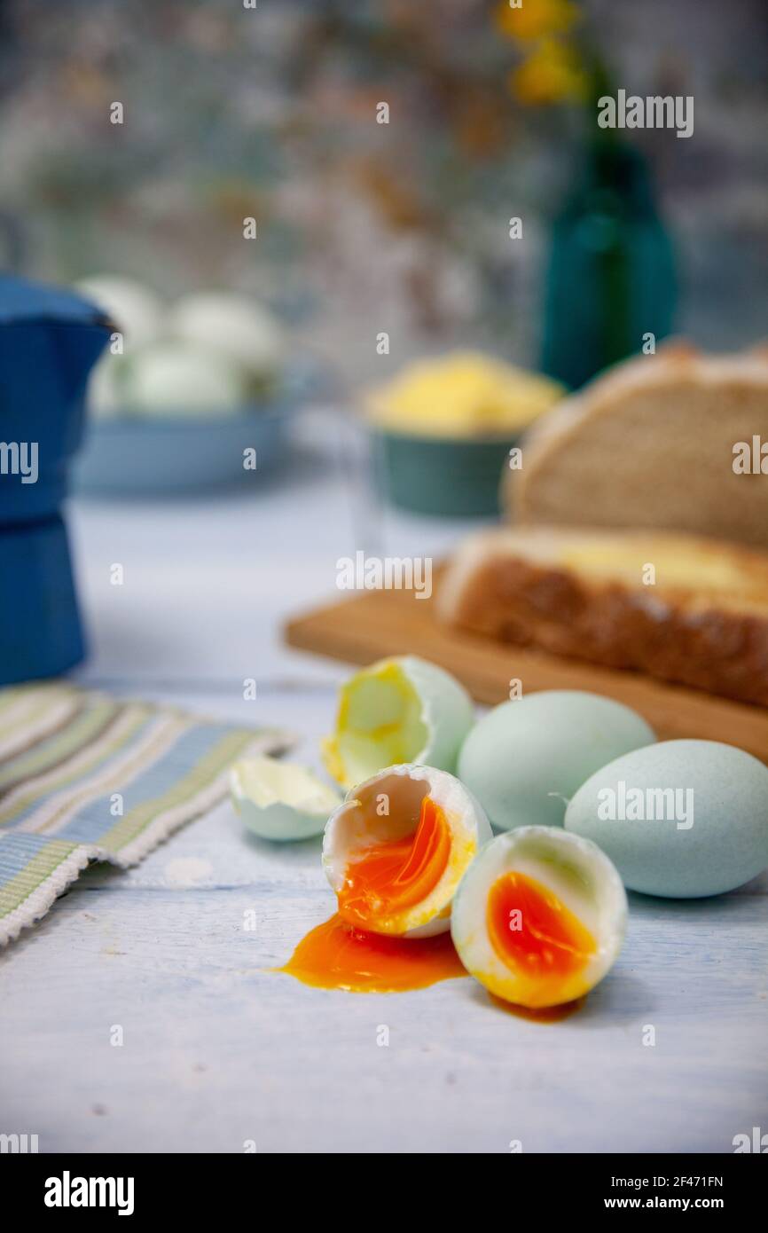 Boiled Blue eggs on a rustic farm table for breakfast Stock Photo - Alamy