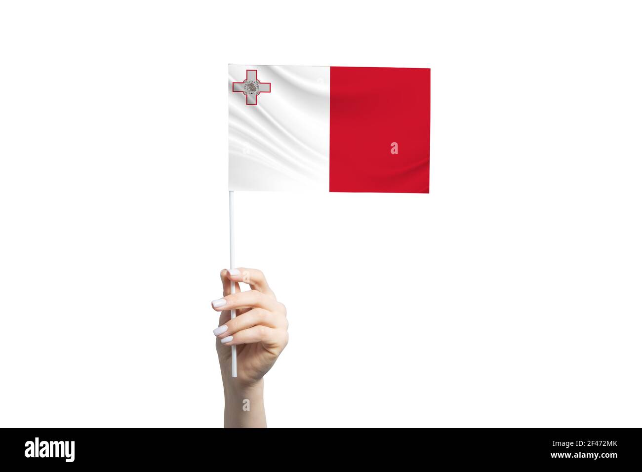 Beautiful female hand holding Malta flag, isolated on white background ...