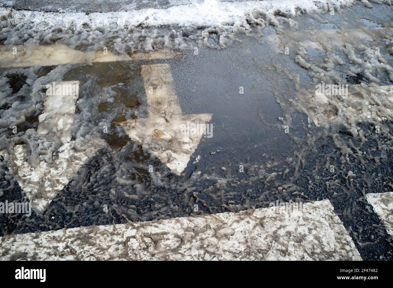 Crosswalk with arrows indicating traffic, for safety on the road ...