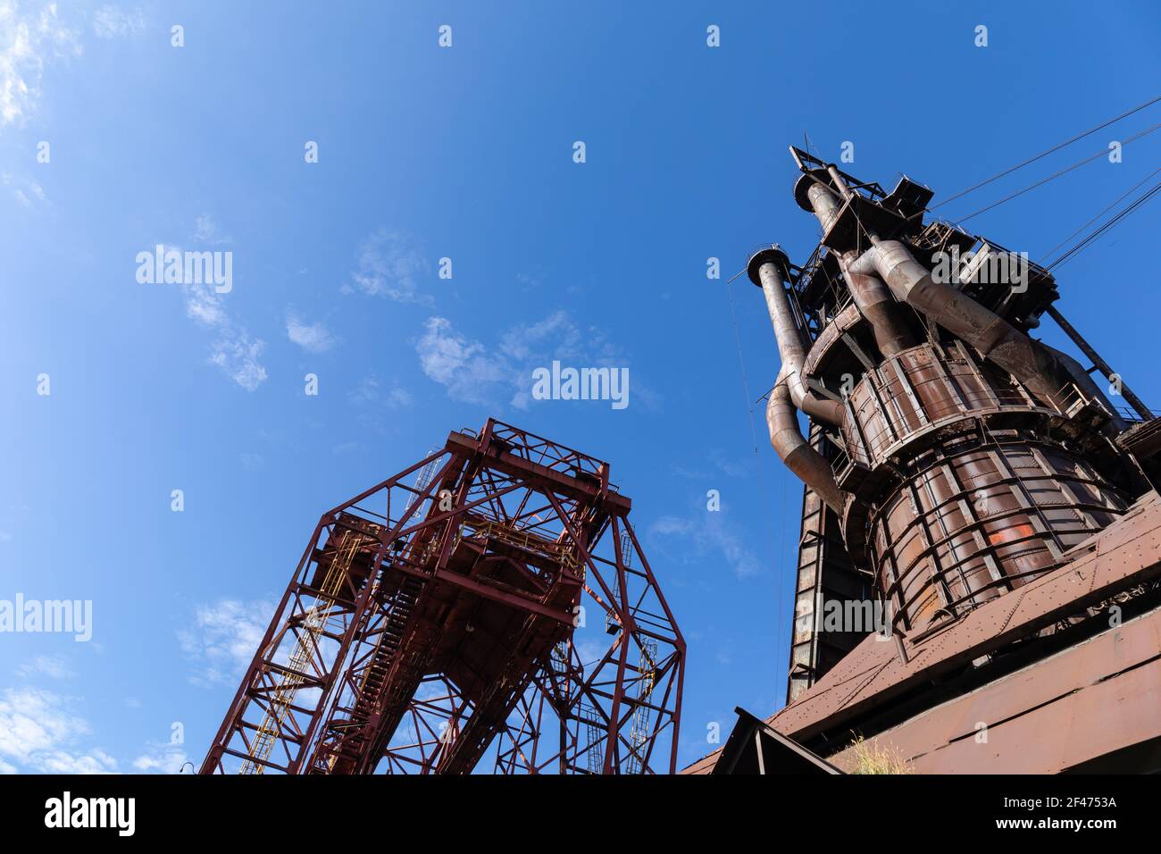 Abandoned industrial steel mill facility, rusting structures on a ...