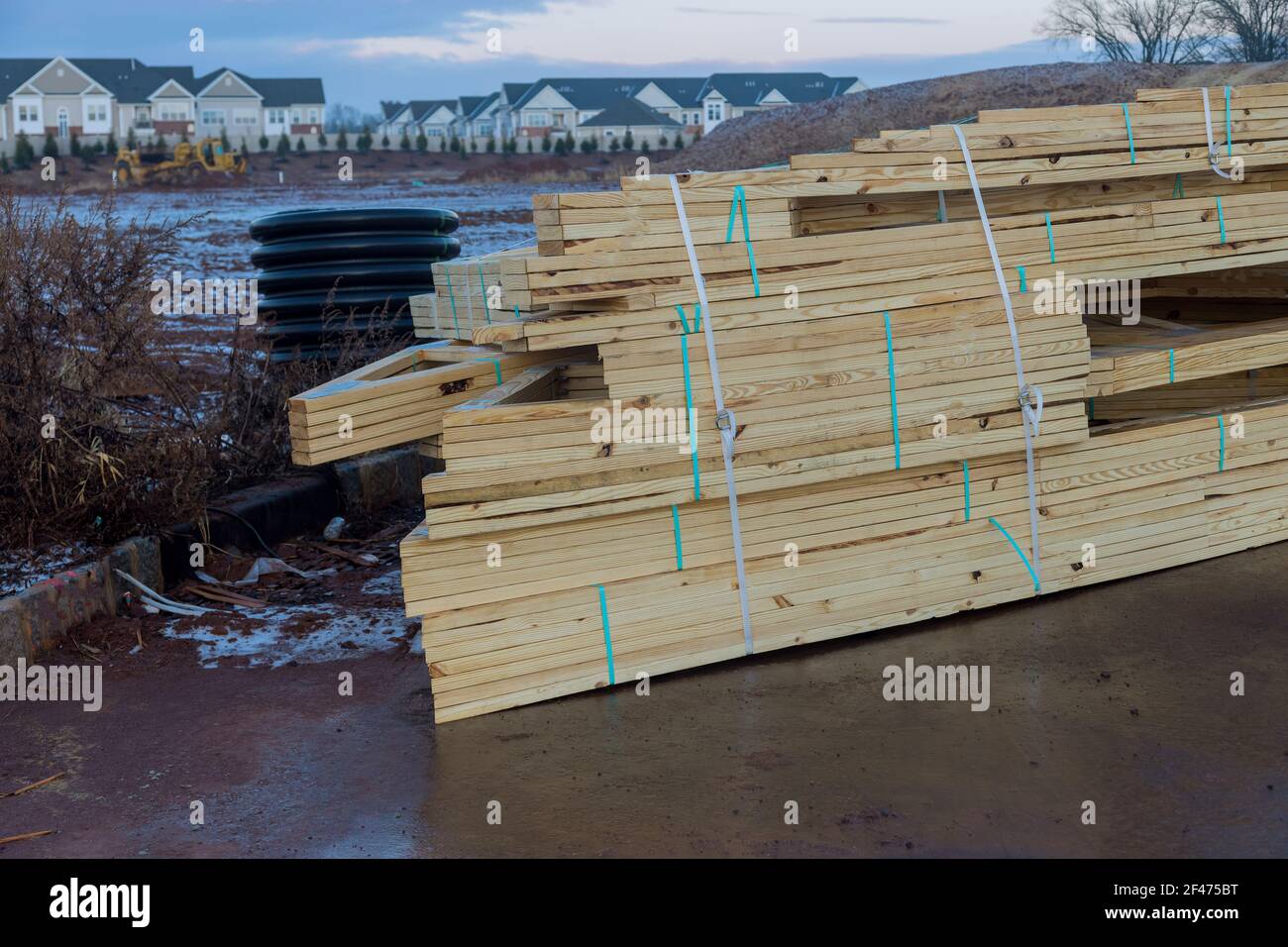 Stacked wooden building materials a stack of boards wood frame and beam ...