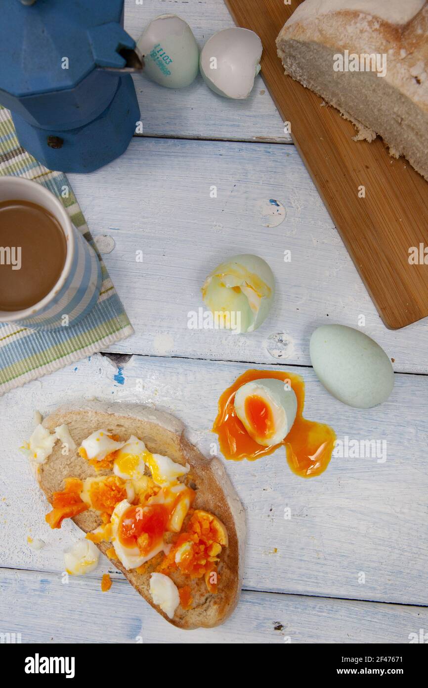 Boiled Blue eggs on a rustic farm table for breakfast Stock Photo - Alamy