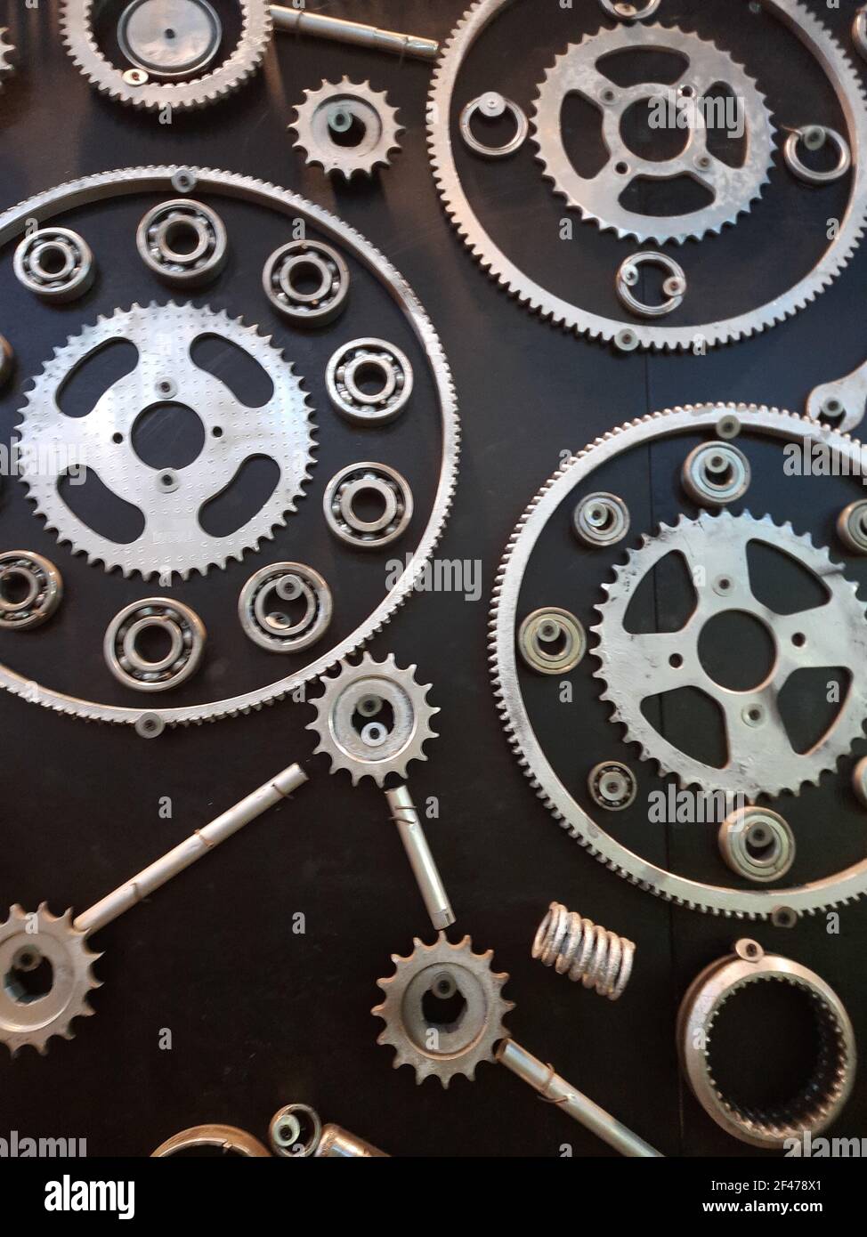 A closeshot of an engine and its metal particles in a round shape put ...