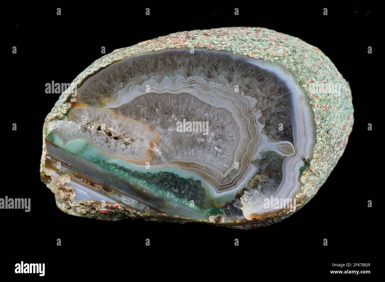 A cross section of the agate stone. Horizontal agate with quartz fill ...