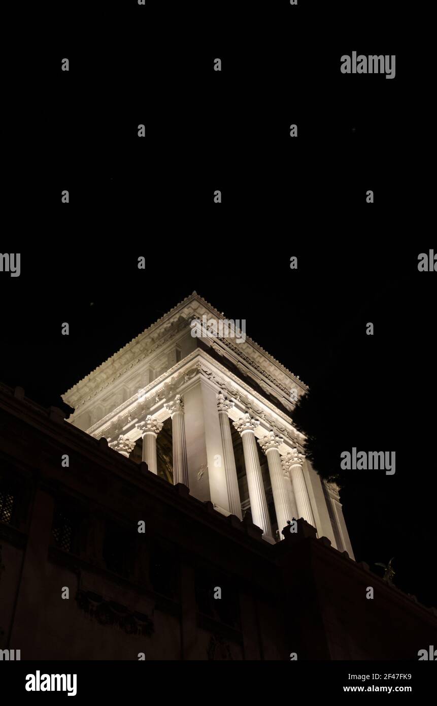 a vertical low angle shot of classical architecture with columns and ...