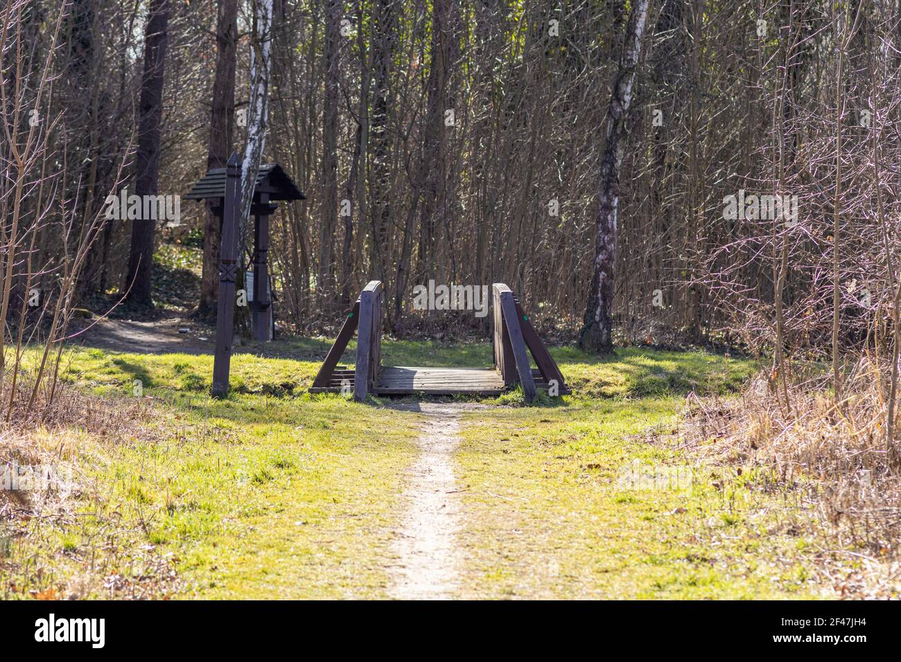 A small wooden bridge in the local park Stock Photo - Alamy