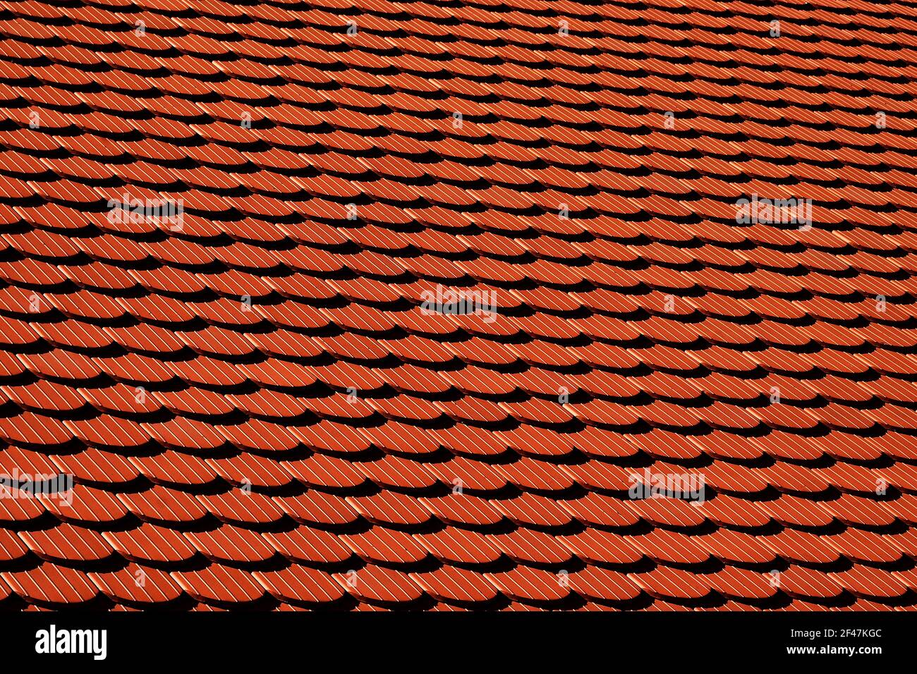 A red shingle roof tiles texture background Stock Photo - Alamy