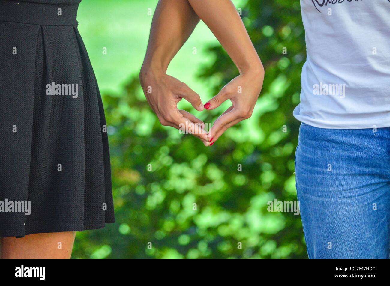 Happy heart hands couple hi-res stock photography and images - Alamy