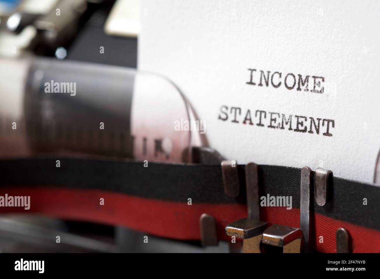 Income statement phrase written with a typewriter Stock Photo - Alamy