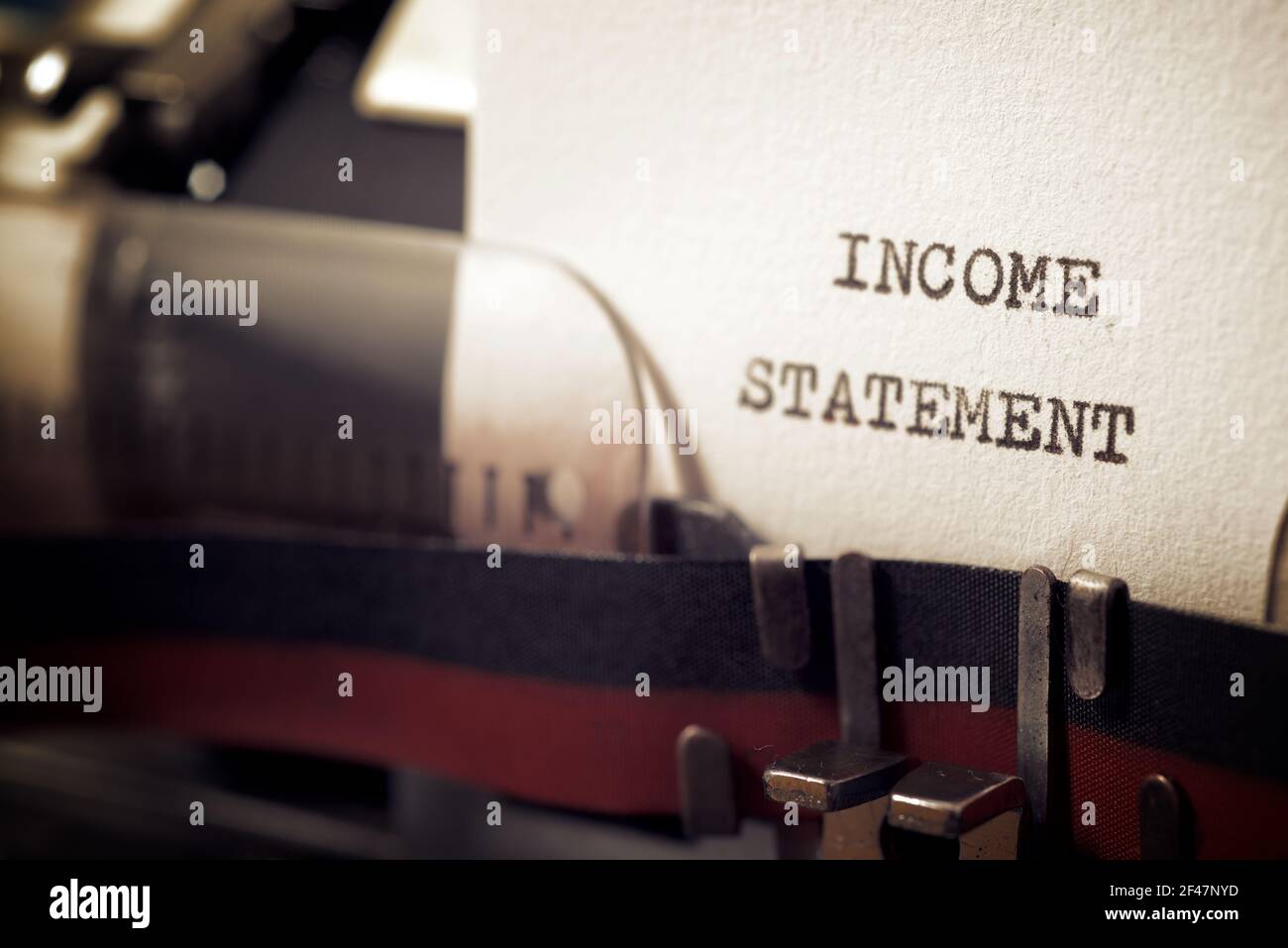 Income statement phrase written with a typewriter Stock Photo - Alamy