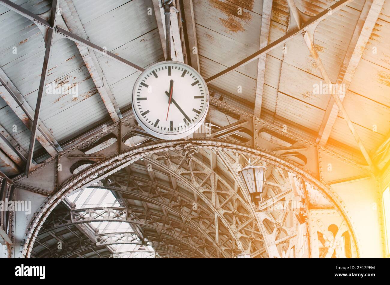 Clock at the railway station Stock Photo - Alamy