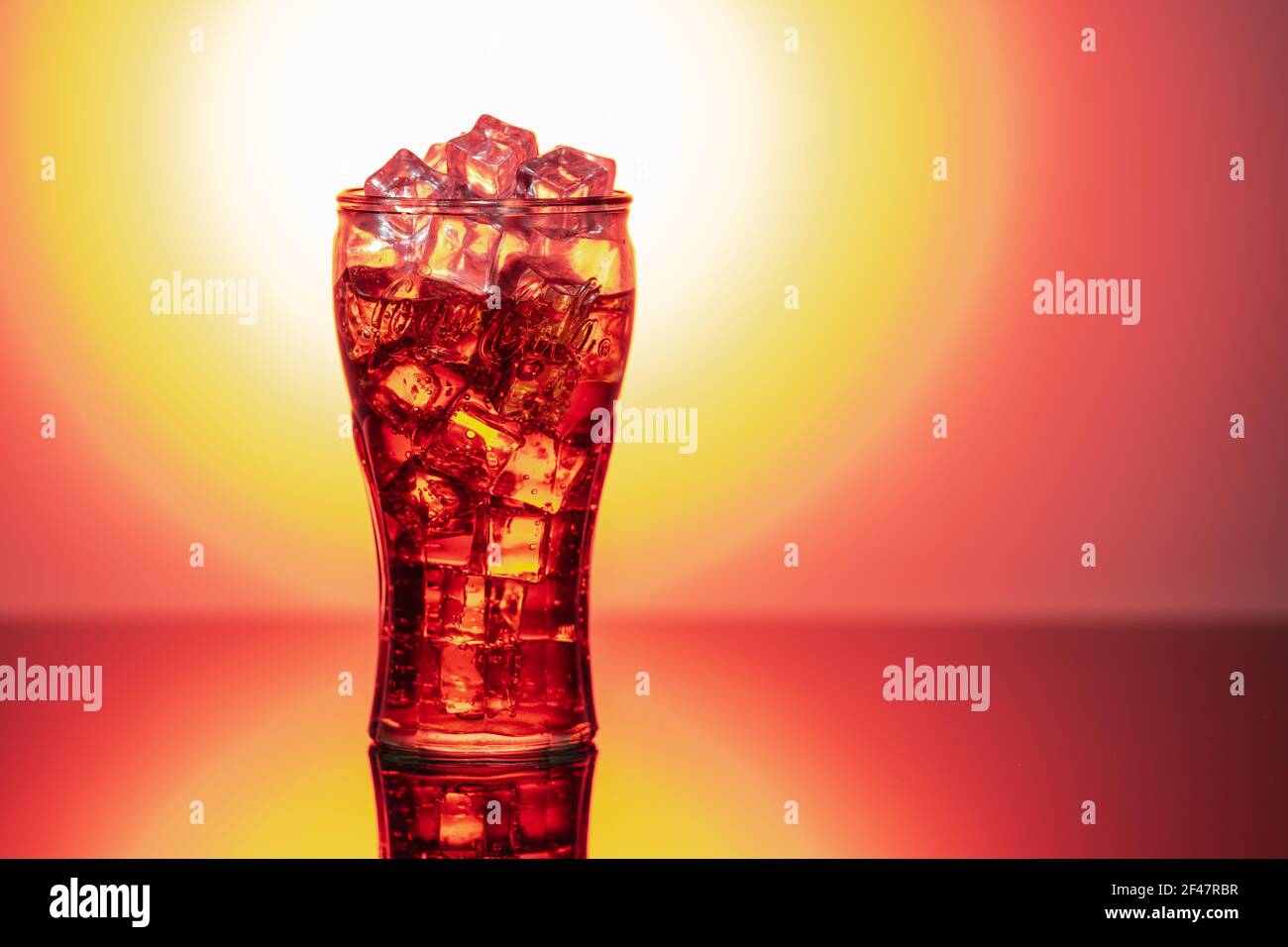 Original glass of Coca Cola with ice and Coca Cola. UK, England, March ...