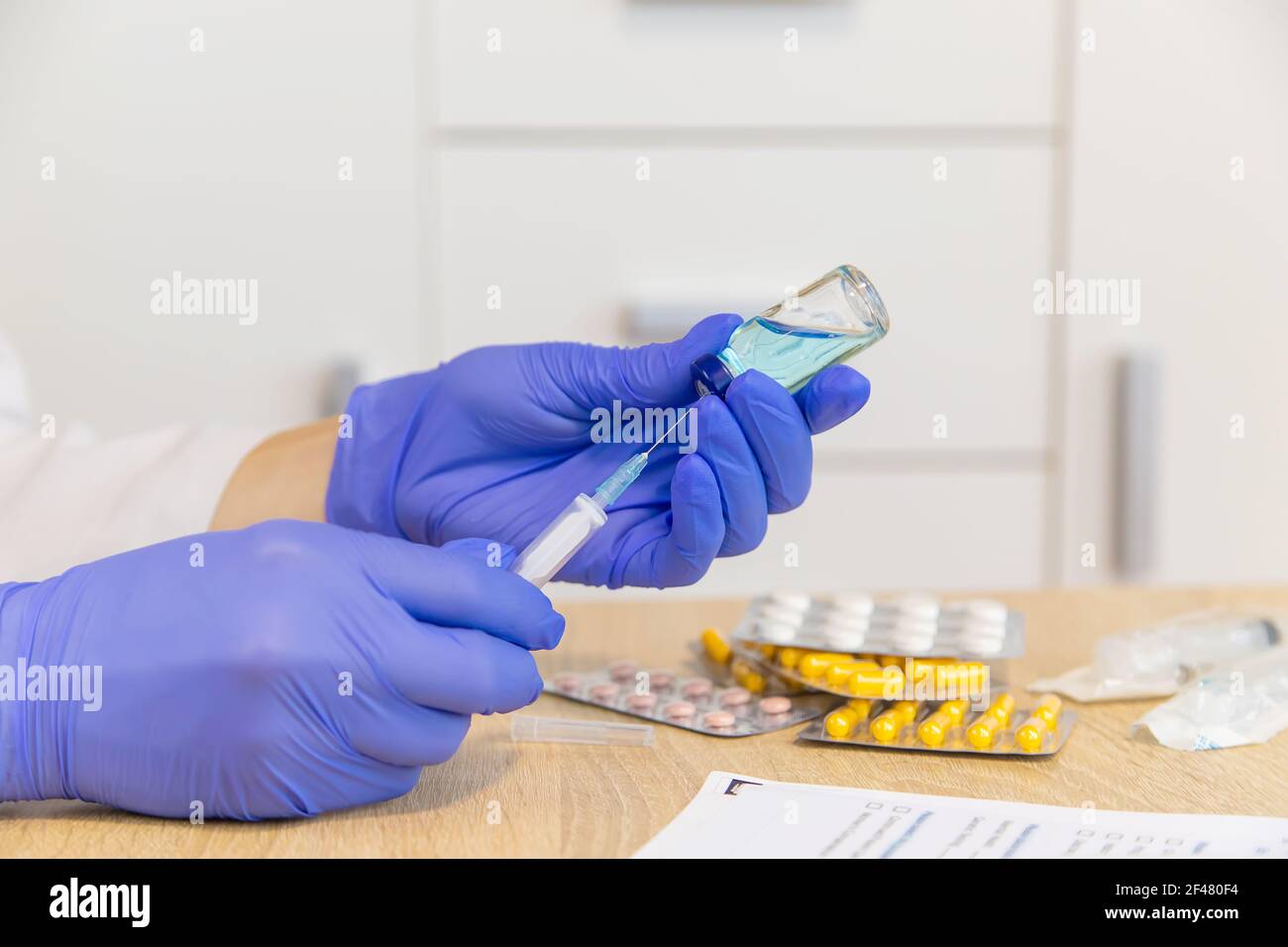 Injection vaccine against virus, injecting child Stock Photo - Alamy