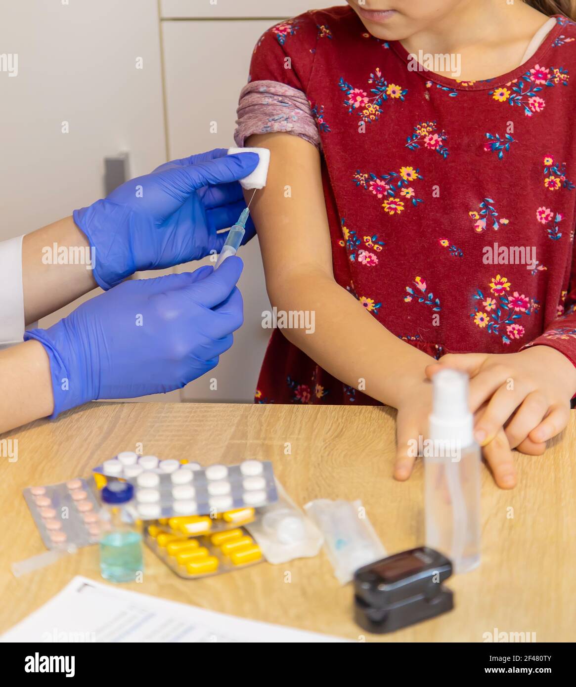 Injection vaccine against virus, injecting child Stock Photo - Alamy