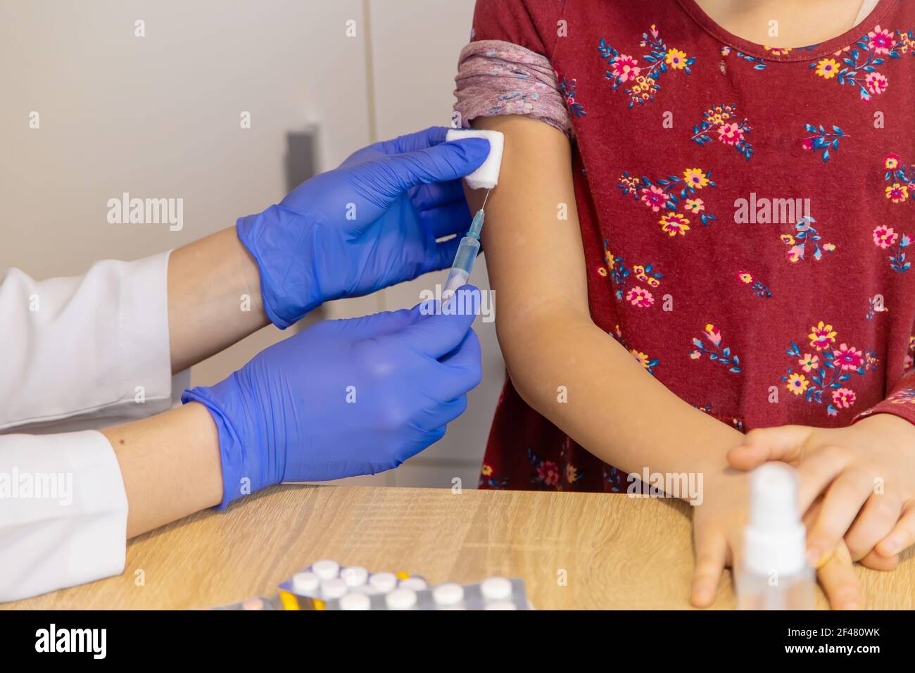 Injection vaccine against virus, injecting child Stock Photo - Alamy