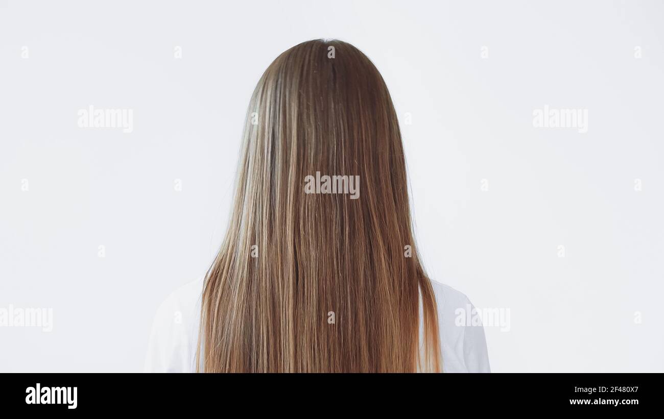 back view of woman with shiny long hair isolated on white Stock Photo ...